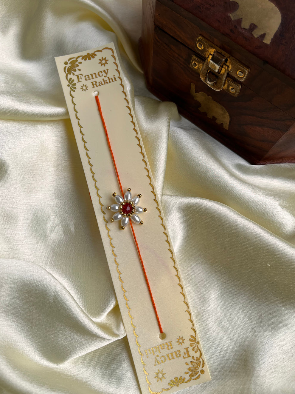 Parijatak flower Rakhi – MahaNath